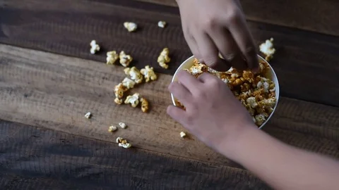 kids eating popcorn together | Stock Video | Pond5
