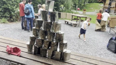 Kids Enjoying Old-Fashioned Play at a Fa... | Stock Video | Pond5