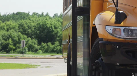 Kids getting off bus and walking to scho... | Stock Video | Pond5