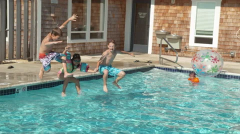 Kids jumping into pool in slow motion, s... | Stock Video | Pond5