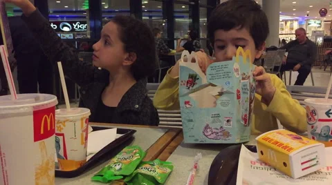 Kids at McDonald's eating fast food | Stock Video | Pond5