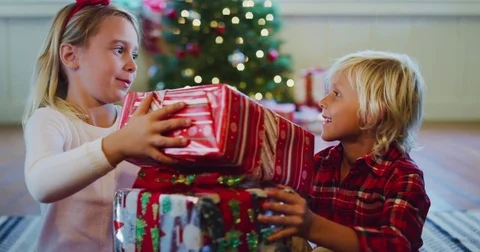 Kids Opening Presents Stock Footage ~ Royalty Free Stock Videos | Pond5