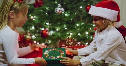 Kids Opening Presents Stock Footage ~ Royalty Free Stock Videos | Pond5