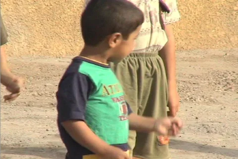 Kids play and jostle while standing on a... | Stock Video | Pond5