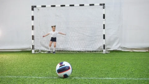 Kids playing football in the indoor foot... | Stock Video | Pond5