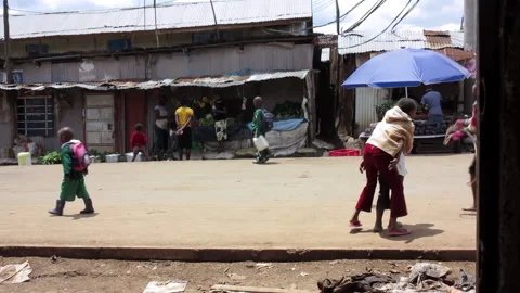 Kids playing in the Kibera slum. | Stock Video | Pond5