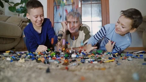 Kids playing with lego | Stock Video | Pond5