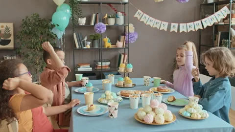 Kids Playing Rock, Paper, Scissors at Ta... | Stock Video | Pond5