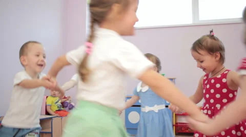 Kids playing running around dancing in k... | Stock Video | Pond5