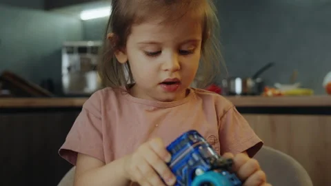 Kids playing with toy cars at home. Happ... | Stock Video | Pond5