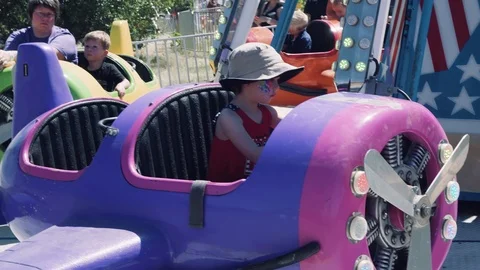 Kids rides at the small town carnival. | Stock Video | Pond5