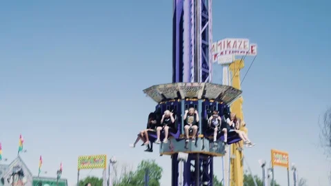 Kids rides at the small town carnival. | Stock Video | Pond5