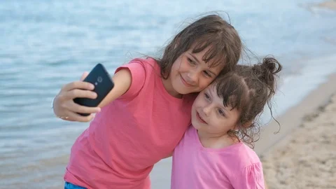 Kids take a selfie. | Stock Video | Pond5