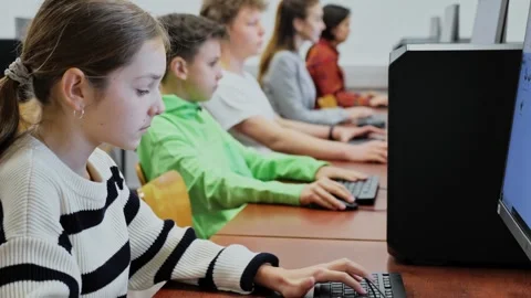 Kids using computers during computer sci... | Stock Video | Pond5