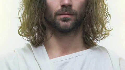 Kind face of holy Jesus Christ becoming ... | Stock Video | Pond5