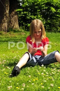 Photograph: Kind im Garten Kind im Garten ,model released, Symbolfoto ...