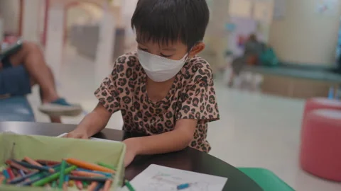Kindergarten boy creative drawing cartoo... | Stock Video | Pond5