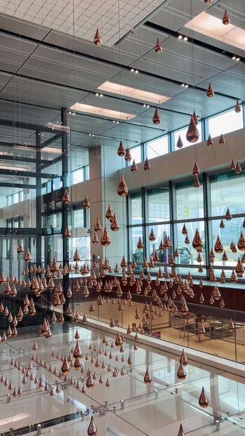 Kinetic Rain sculpture at Changi Airport... | Stock Video | Pond5