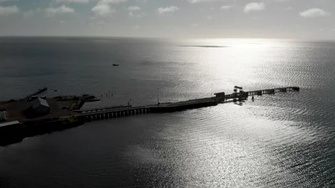 Kingscote Jetty and city skyline, aerial... | Stock Video | Pond5
