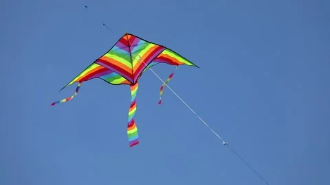 kite with the colors of the rainbow flyi... | Stock Video | Pond5