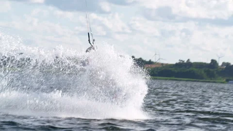 Kiteboarder jumping the waves | Stock Video | Pond5