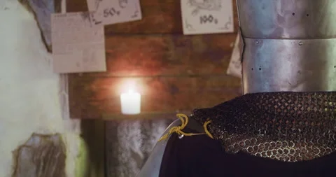 Knight reads messages on bulletin board | Stock Video | Pond5