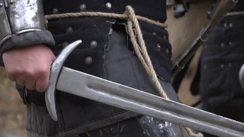 Knights carry a sword in their hands | Stock Video | Pond5
