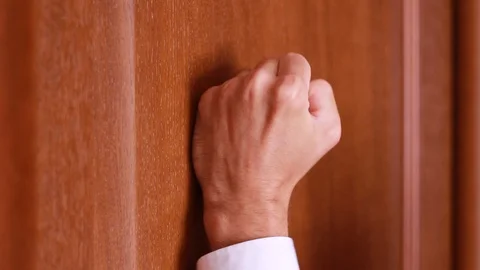 Knocking on wooden door with fist | Stock Video | Pond5