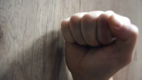 Knocking on wooden door with fist | Stock Video | Pond5