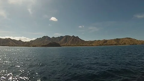 Komodo Island in the distance from boat ... | Stock Video | Pond5
