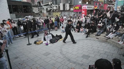 Korean dancers busking in Hongdae during... | Stock Video | Pond5