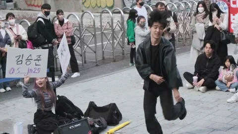 Korean dancers busking in Hongdae during... | Stock Video | Pond5