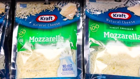 Kraft shredded bag cheese variety hangin... | Stock Video | Pond5