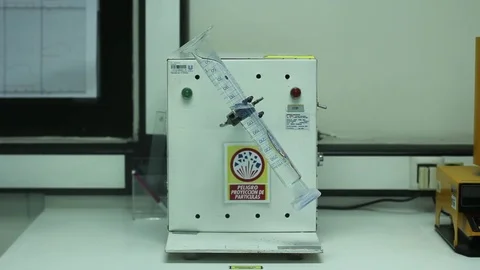 Lab equipment with hand activating machi... | Stock Video | Pond5