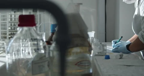 Labeling lab test report samples quickly... | Stock Video | Pond5