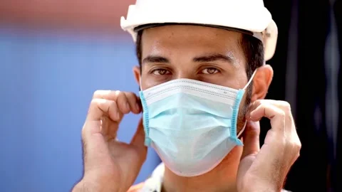 Labor man worker is wearing protection m... | Stock Video | Pond5