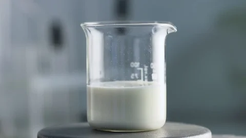 Laboratory experiments. Milk testing. Re... | Stock Video | Pond5