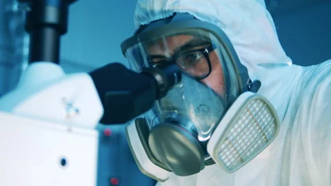 Laboratory specialist in a hazmat suit i... | Stock Video | Pond5