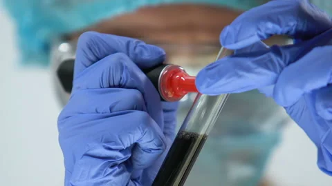Laboratory worker marking test tube with... | Stock Video | Pond5