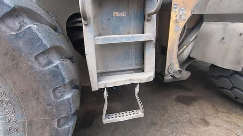 Ladder leading up to cabin on loader | Stock Video | Pond5