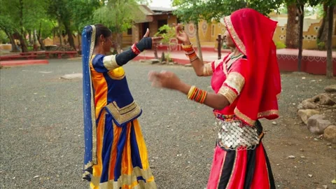Ladies into ethnic dress dance at rural ... | Stock Video | Pond5