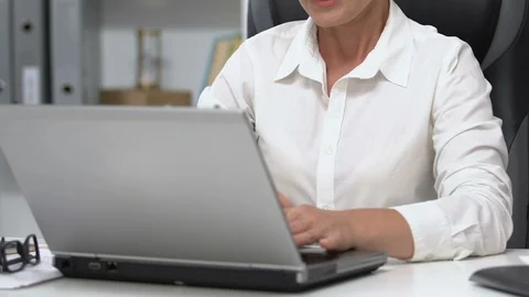 Lady boss working on laptop hardly breat... | Stock Video | Pond5