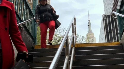 lady entering subway station staircase E... | Stock Video | Pond5
