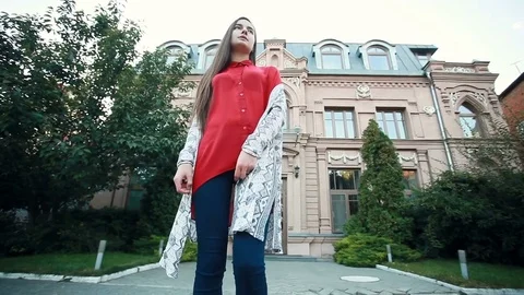 lady is rushing in the city-center turns... | Stock Video | Pond5