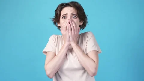 Lady shocked horror screaming panic isol... | Stock Video | Pond5