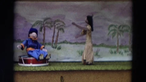 LAHAINA MAUI HAWAII-1968: Two Puppet Cha... | Stock Video | Pond5