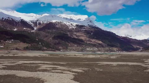 Lake Reschen reservoir, zooming in. The ... | Stock Video | Pond5