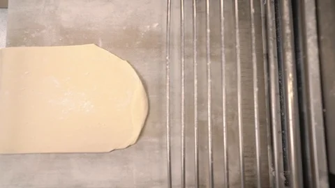 Laminated dough on the reversible counte... | Stock Video | Pond5