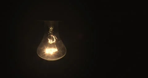 Lamp with tungsten bulb assembly slowly ... | Stock Video | Pond5