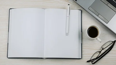 Laptop, diary, glasses and coffee cup o... | Stock Video | Pond5